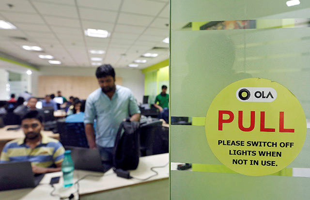 Ola raises $330 mn in fresh round led by SoftBank: Report